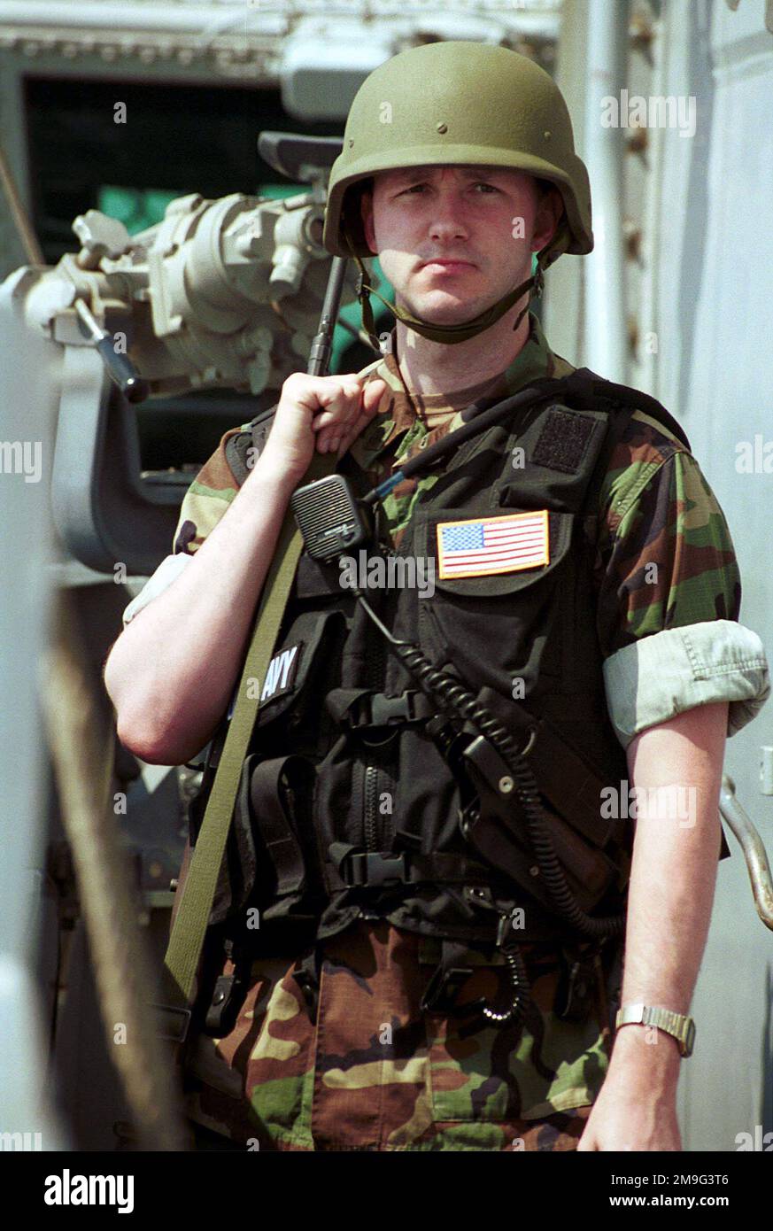 US Navy Storekeeper Second Class John Gottshall stands a force ...