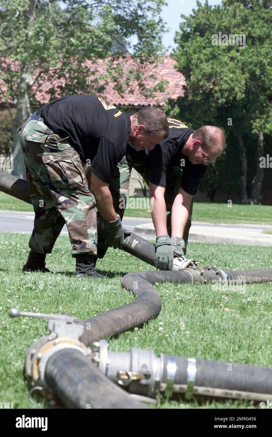 US Air Force MASTER Sergeant Jeff Hamby and US Air Force STAFF Sergeant ...