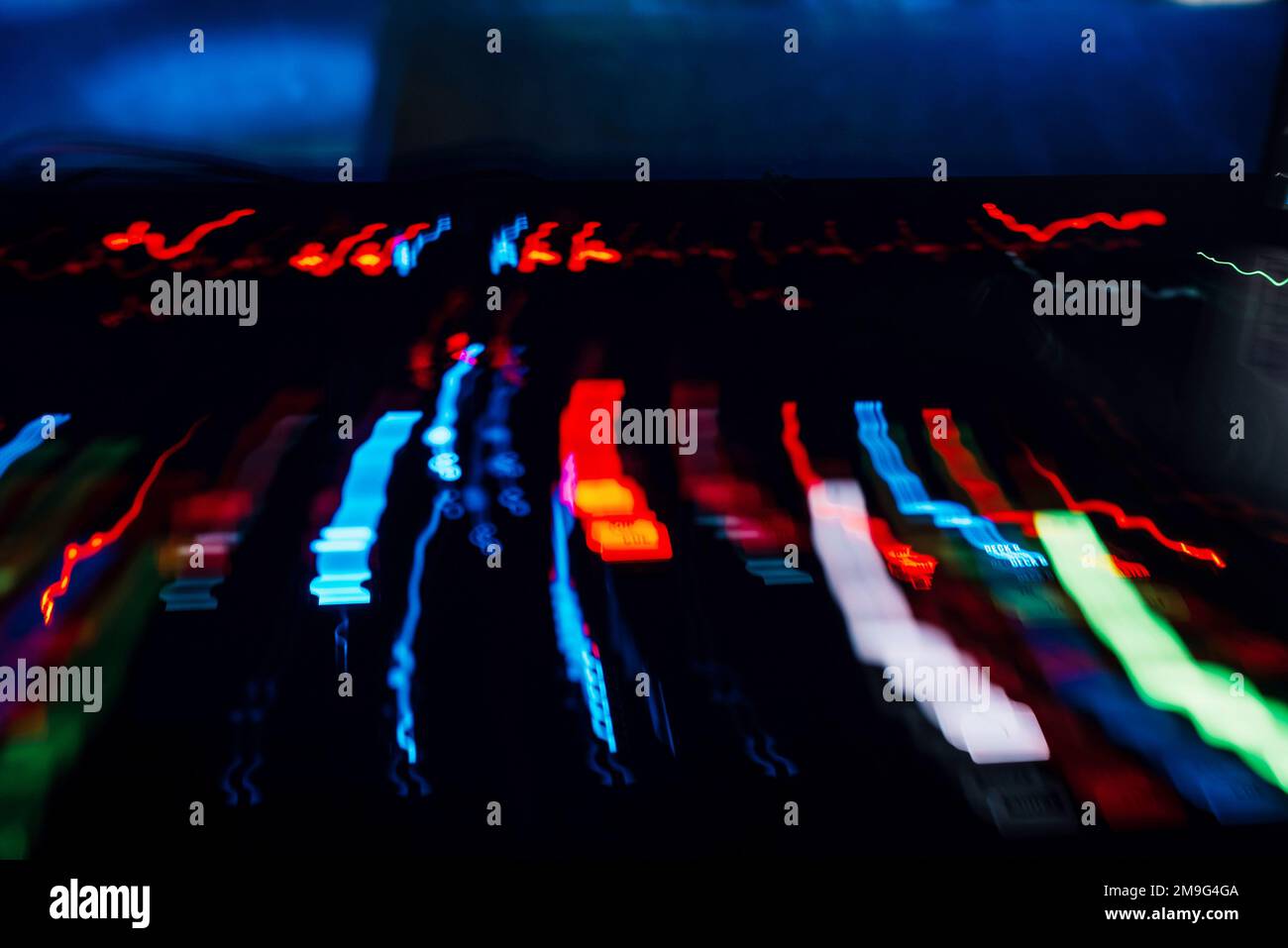 DJ mixer controller with colored with multi-colored effect smudge from ...