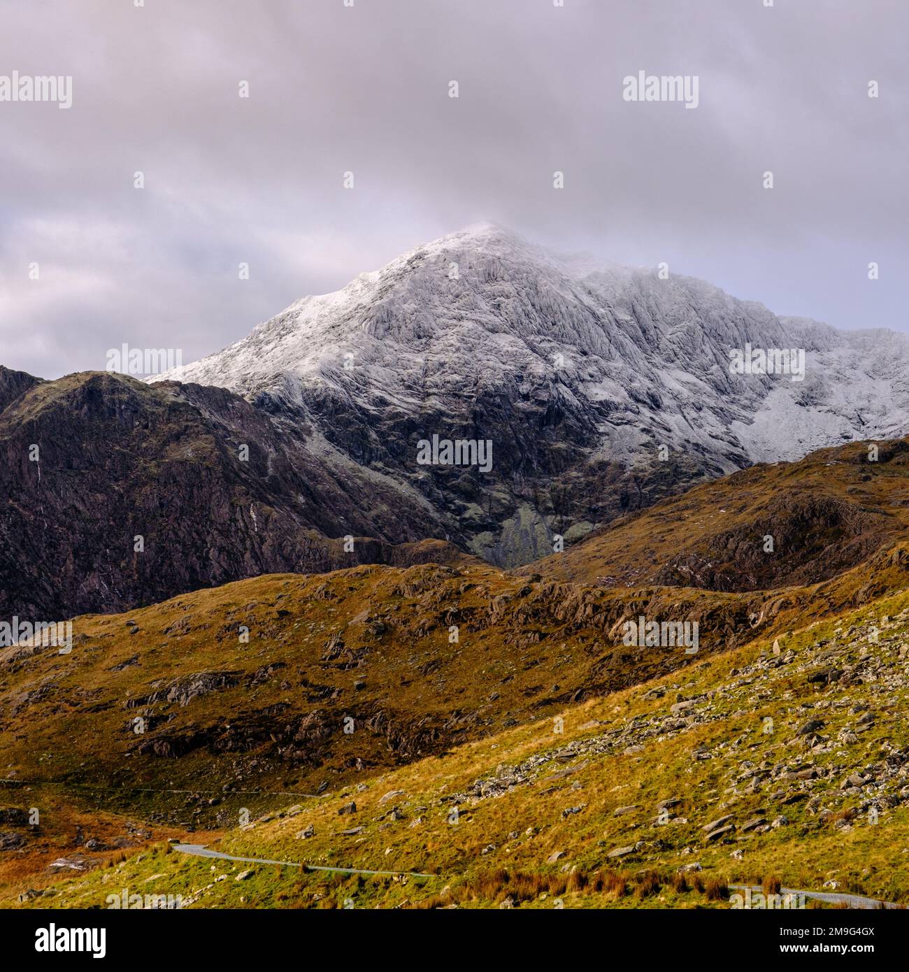 The snow covered summit of Snowdon in Snowdonia National Park, North ...