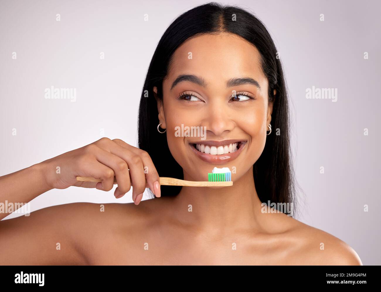 Pink young woman brushing teeth hi-res stock photography and images - Alamy