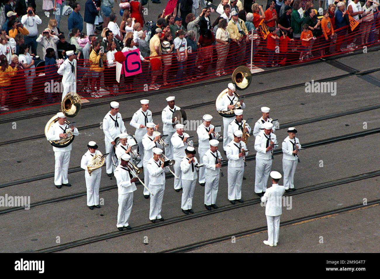 A US Navy band plays for a crowd aboard the aircraft carrier USS HARRY ...