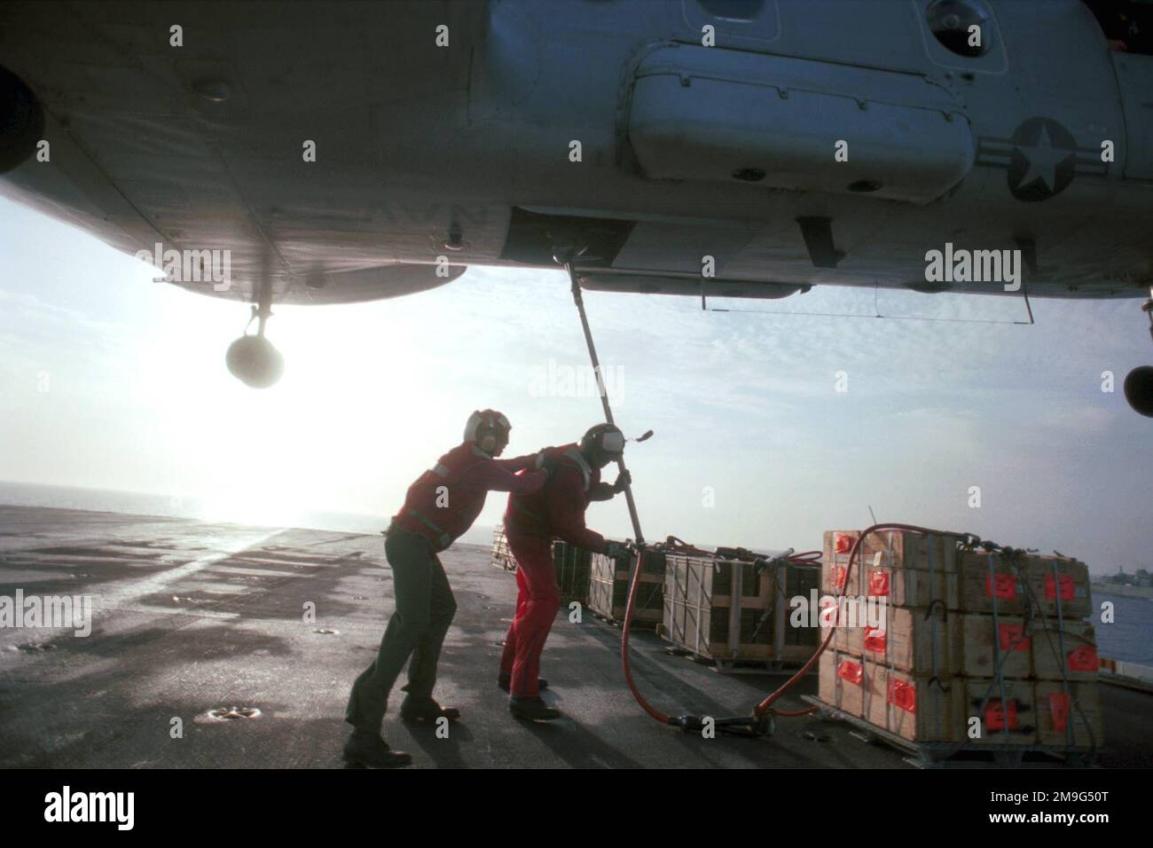 US Navy Aviation Ordnanceman Second Class Toby Snowden and US Navy ...