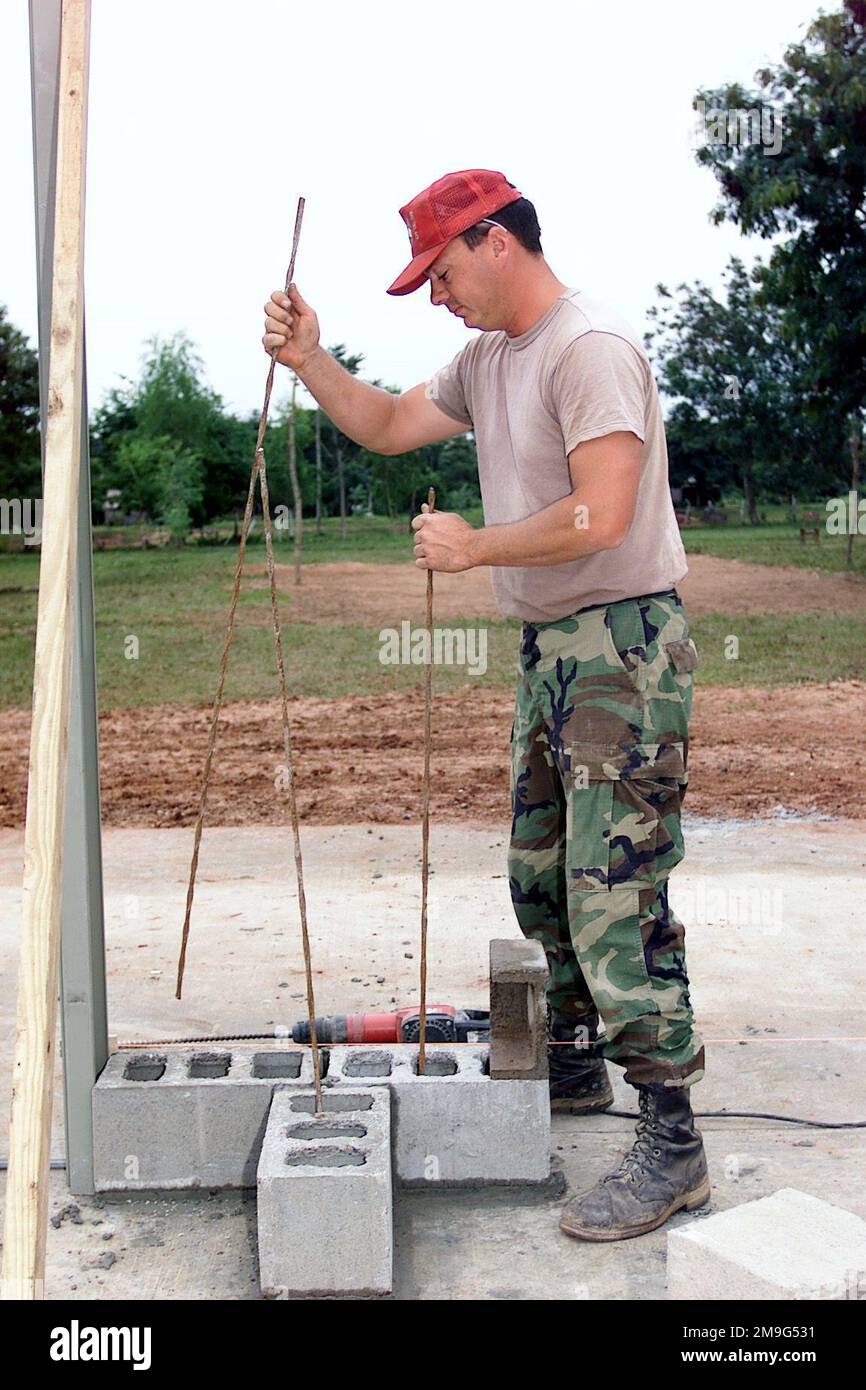 US Air Force STAFF Sergeant Kenny Edwards, from the 823rd Red Horse ...