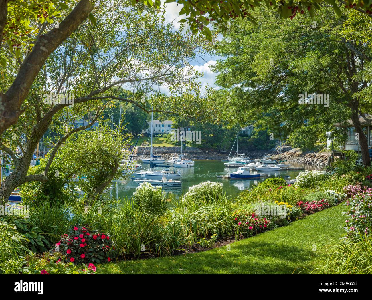 Harbor seen from garden, Perkins Cove, Ogunquit, Maine, USA Stock Photo ...