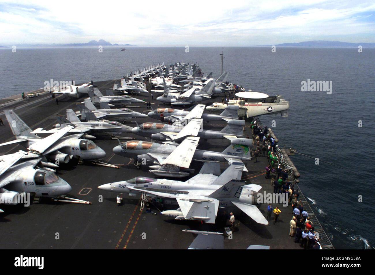 Shot of the flight deck, with E-2C Hawkeye, S-3B Viking and F/A-18 ...