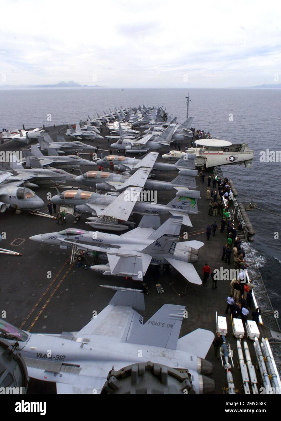 Sailors and Marines stationed on board USS HARRY S. TRUMAN (CVN 75 ...