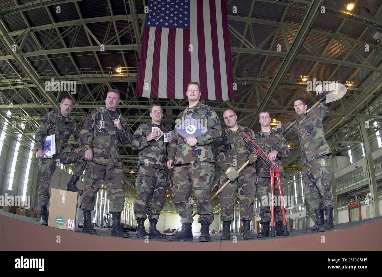 010518-F-8705R-002. [Complete] Scene Caption: Seven of the eight people ...