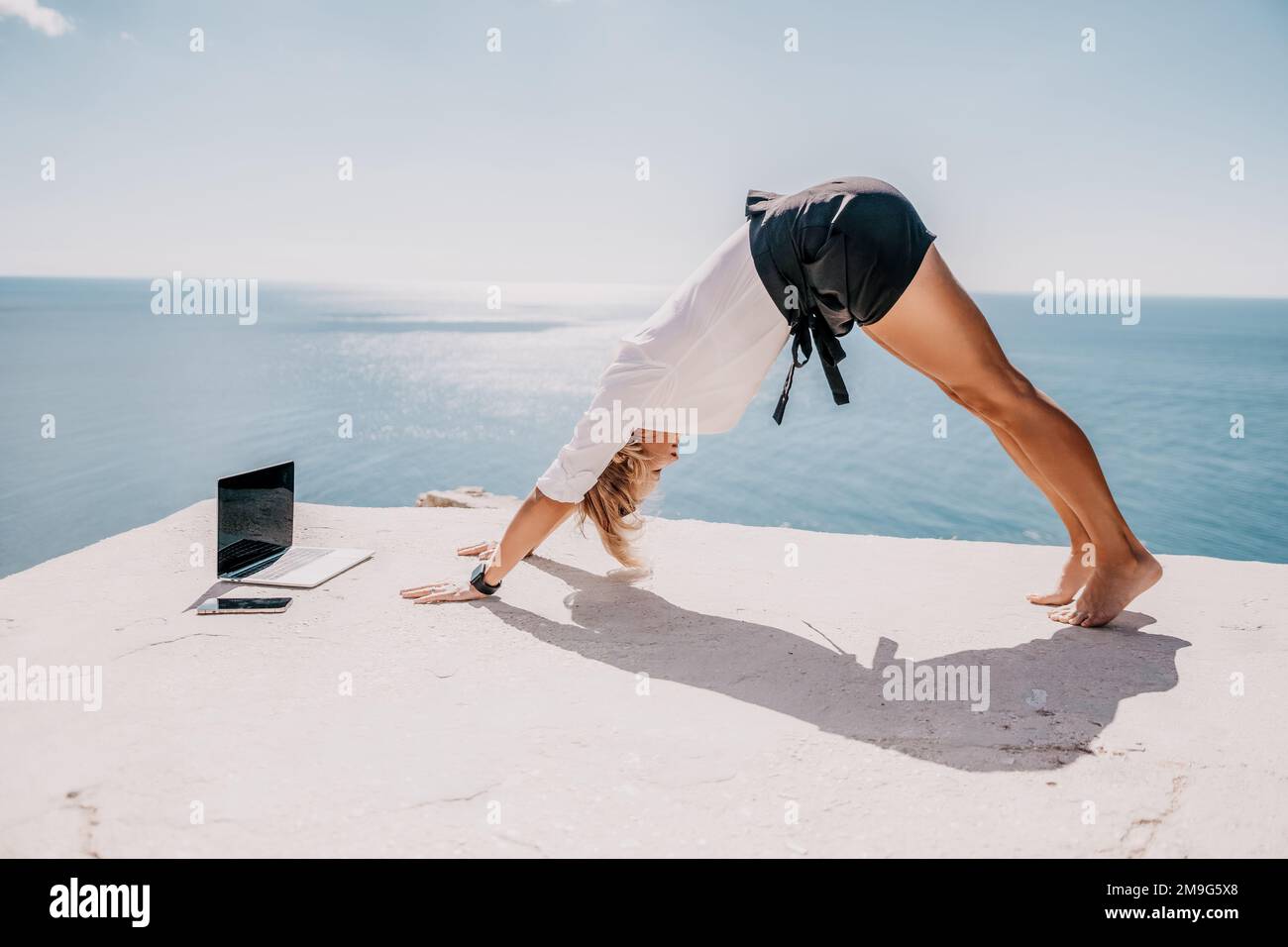 Business woman meditating at work hi-res stock photography and images ...