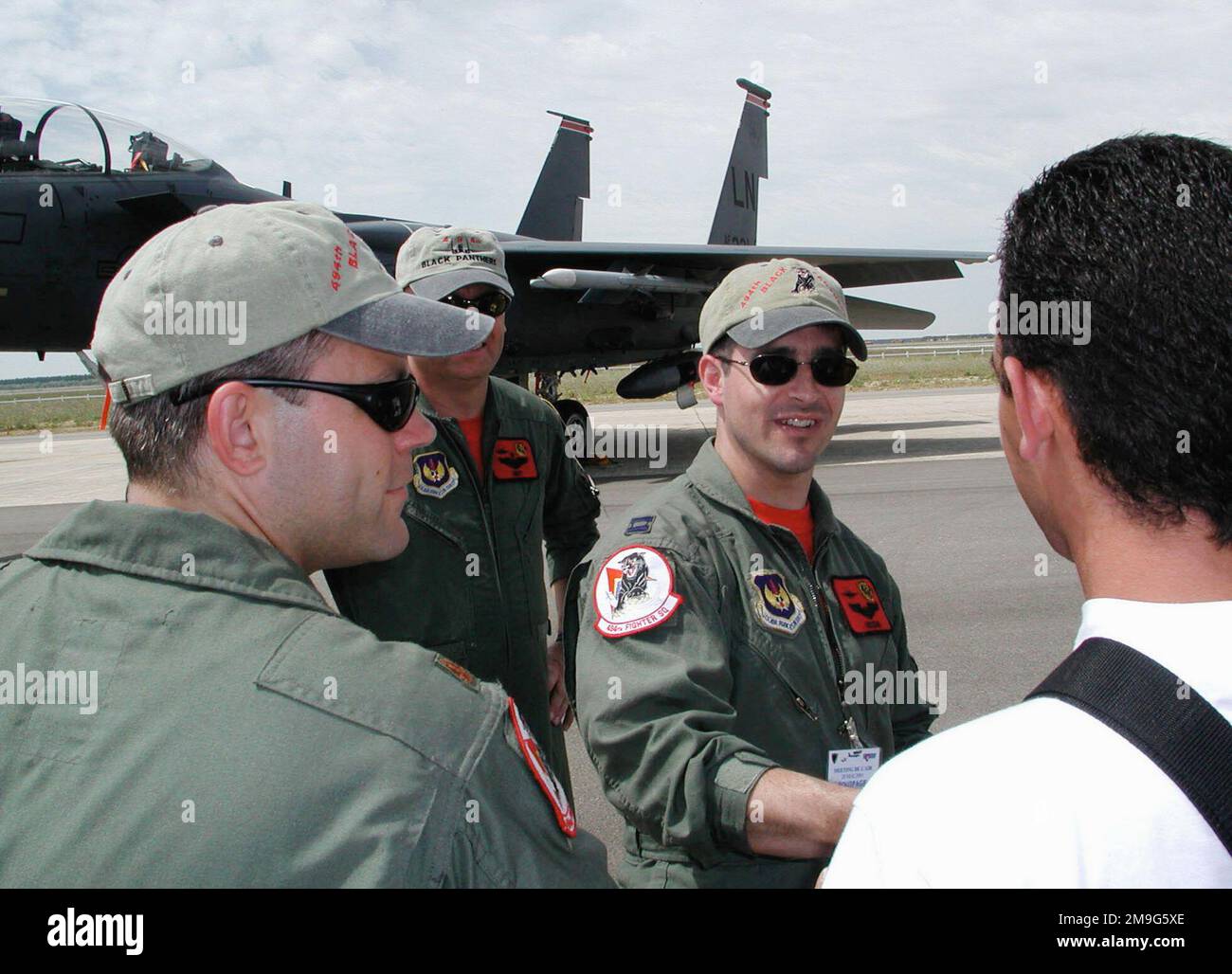 US Air Force Captain Mike Quintini (center) and US Air Force Major Bill ...