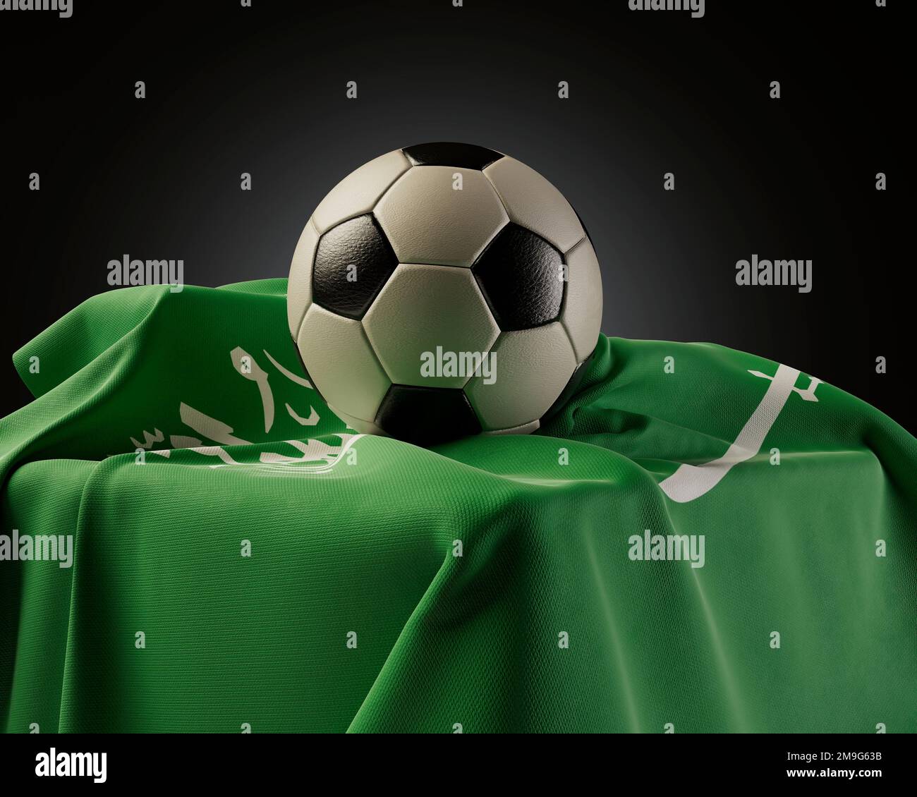 A regular soccer balls resting on a Saudi Arabia flag draped over a ...