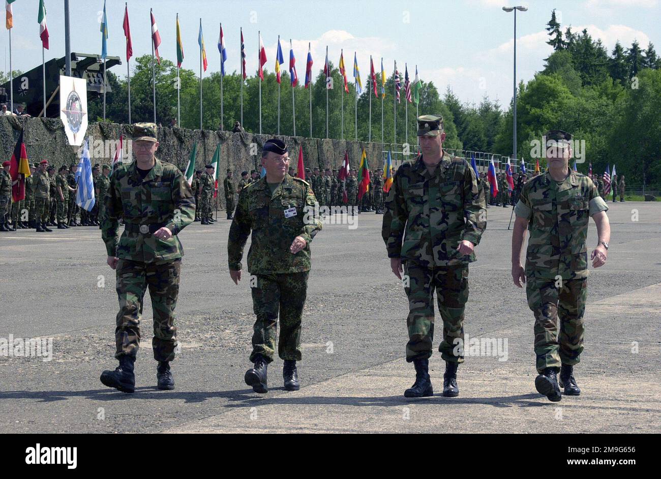 COMBINED ENDEAVOR 2001 commanders march toward the colors, left to ...