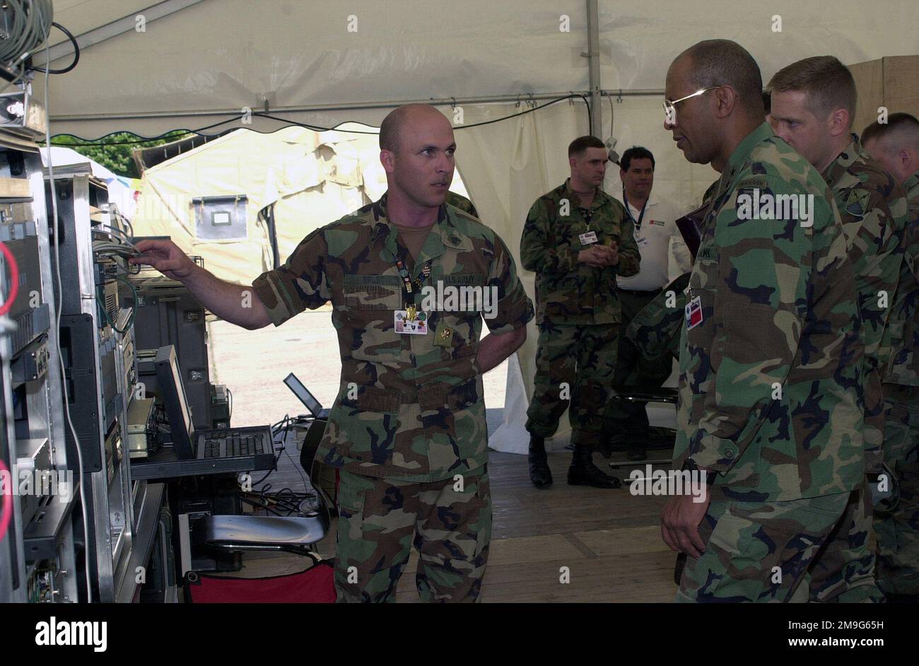 US Army Sergeant Mark Brust (left), from 5th Signal Command, briefs US ...