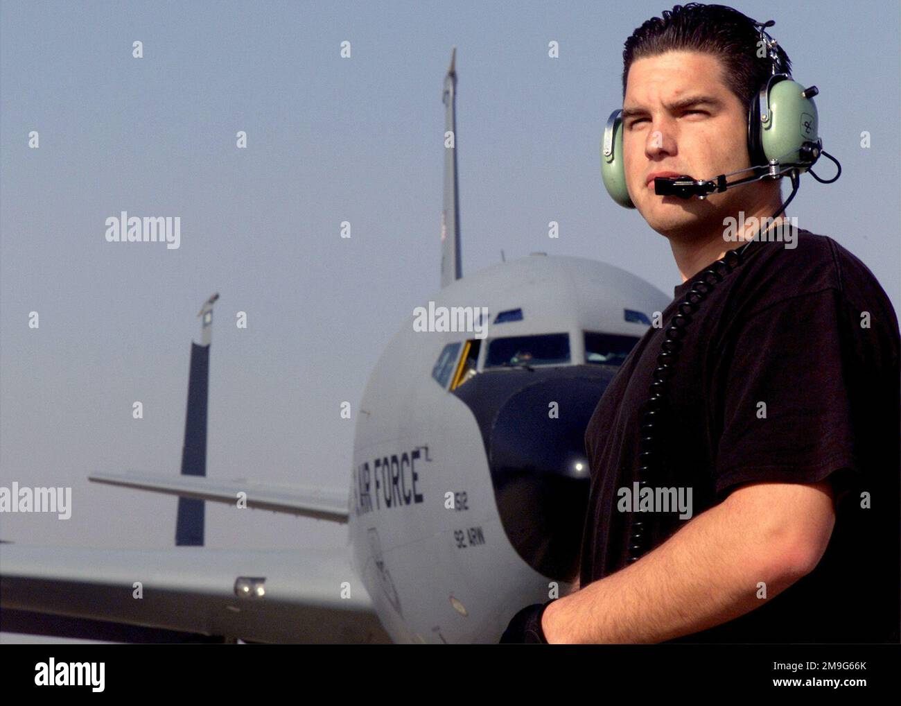 STAFF Sergeant John Chasse, 92d Aircraft Generation Squadron speaks to the aircraft commander ...