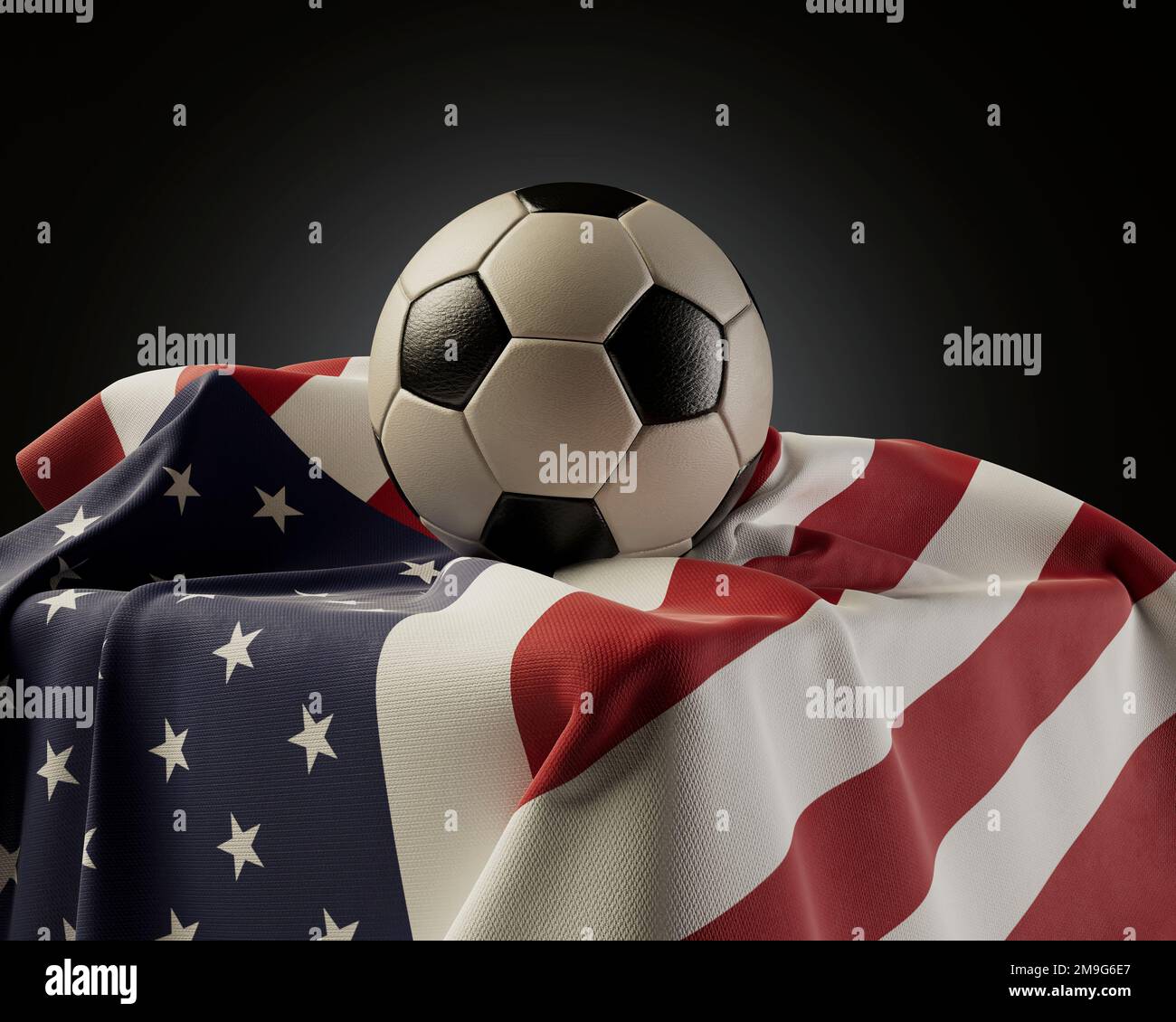 A regular soccer balls resting on a USA flag draped over a plinth on an ...