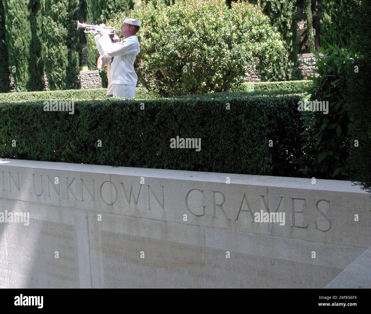US Navy PETTY Officer 1ST Class Jim Murdock, USN, sounds Taps during ...