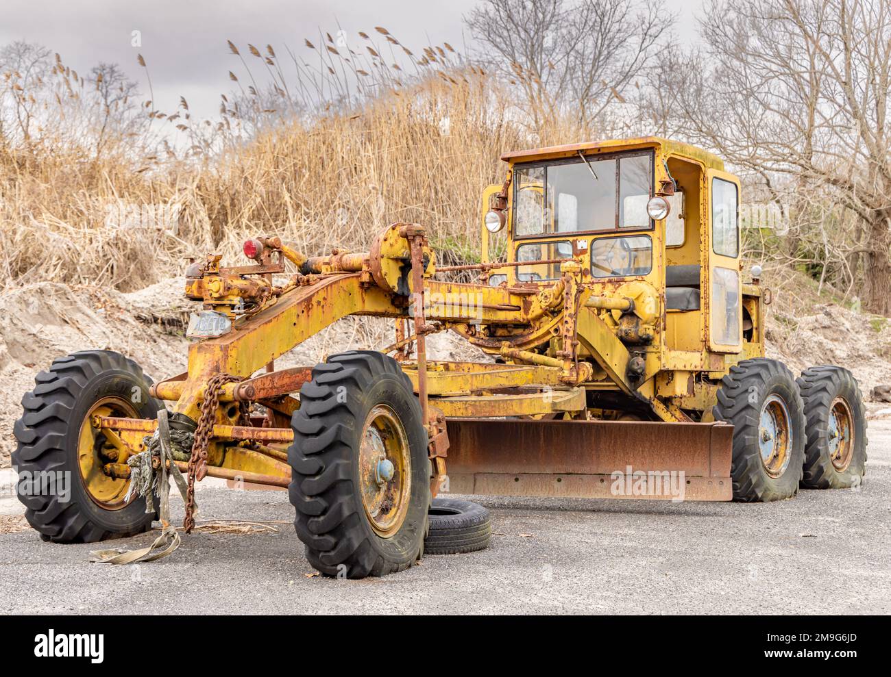 old rusted grader Stock Photo - Alamy