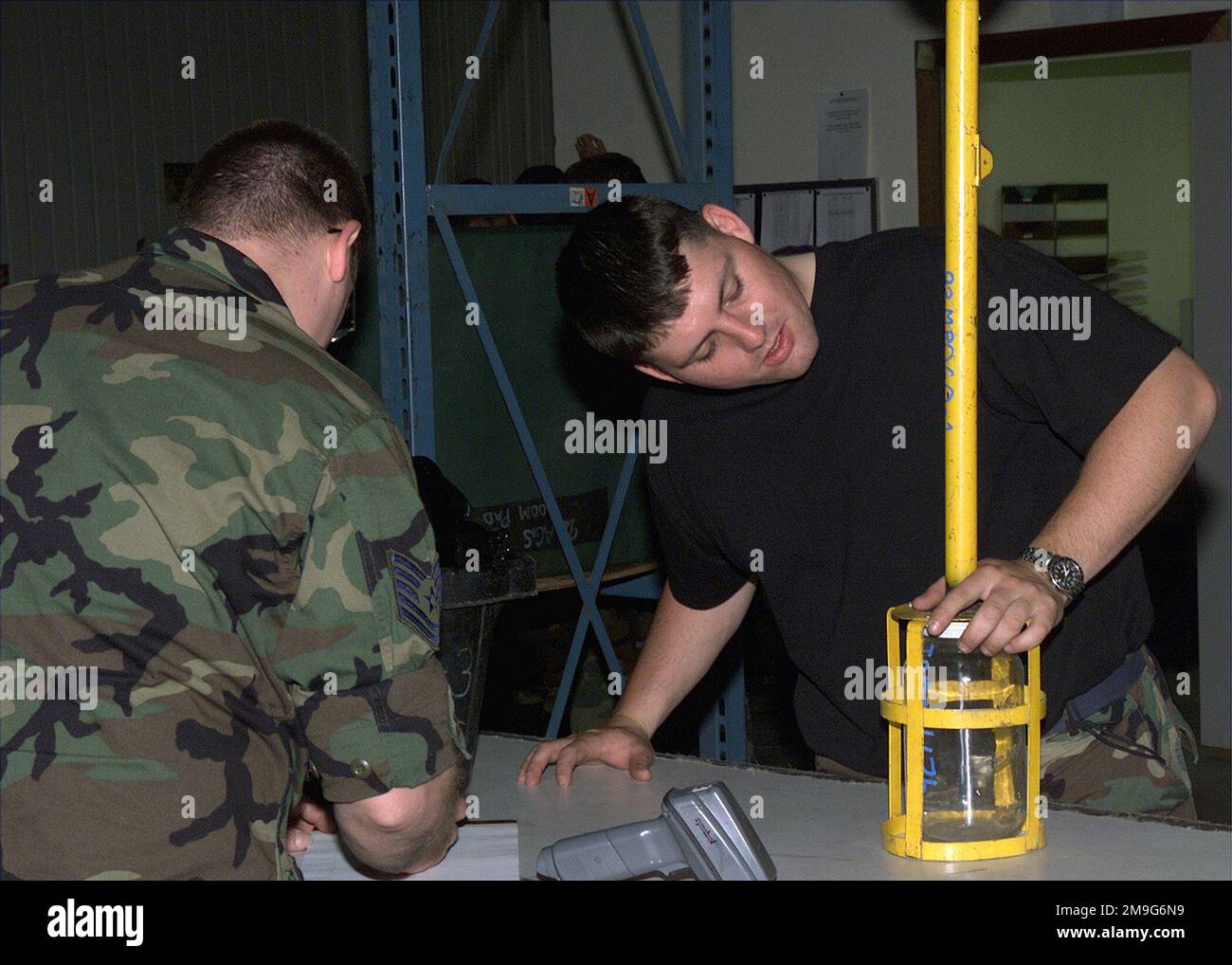 SENIOR AIRMAN Jay Evans (right), a 92d Aircraft Generation Squadron ...