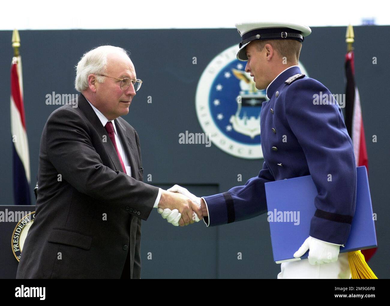 Vice President Richard B. Cheney congratulates an honor graduate cadet ...