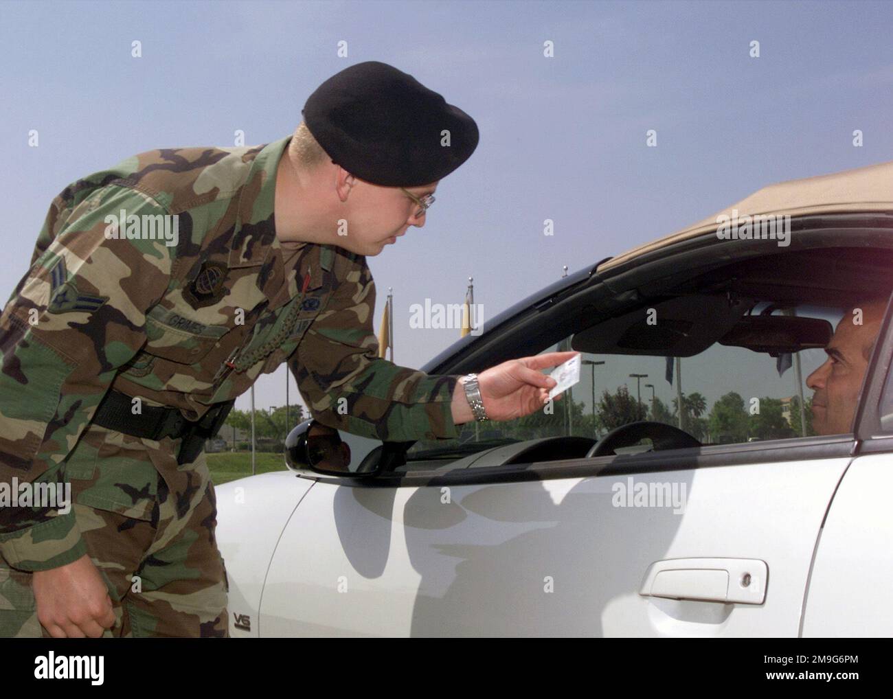 AIRMAN 1ST Class Andrew H. Grimes, 92d Security Forces Squadron, checks ...