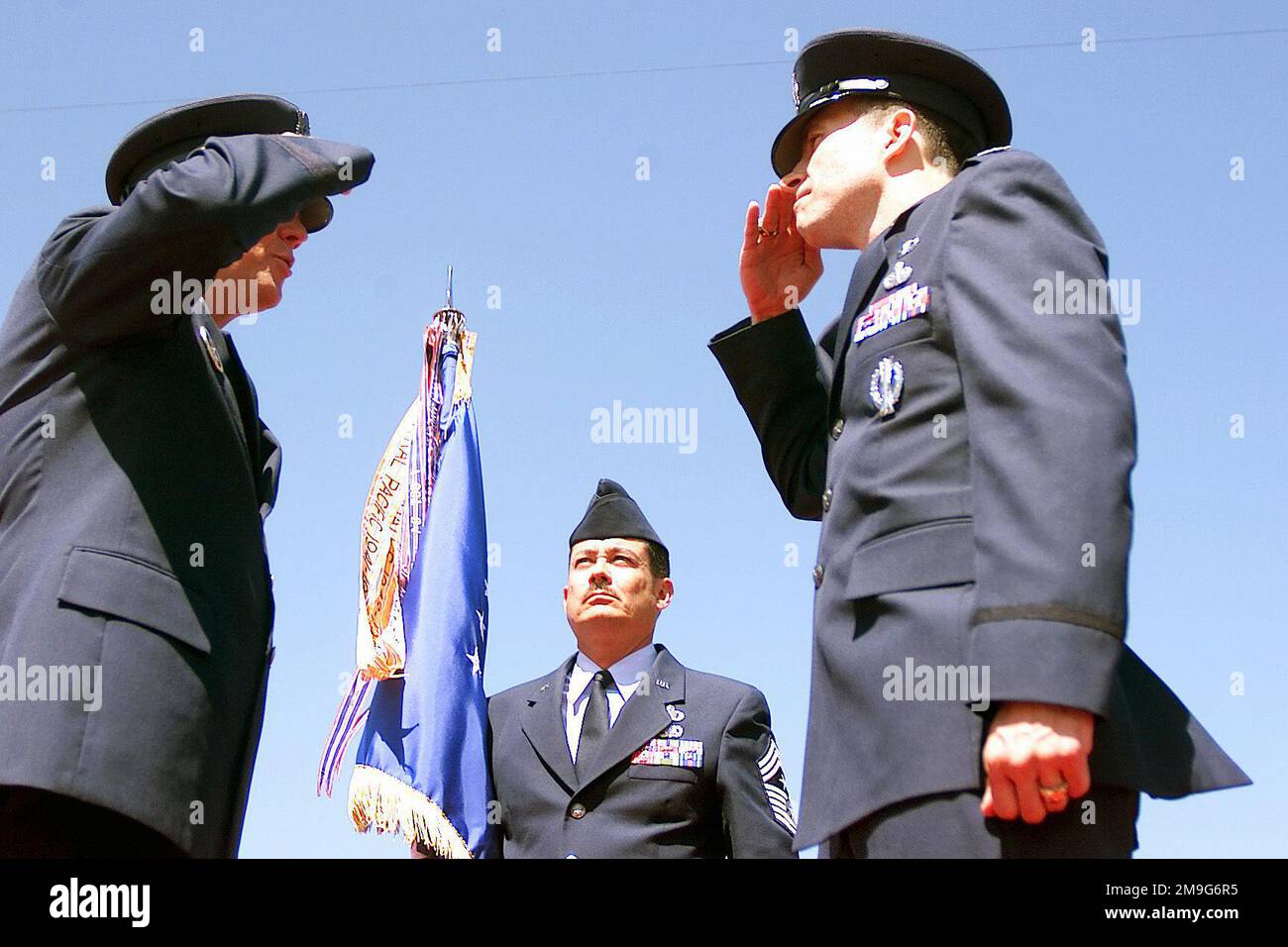 Colonel (COL) Robert M. Worley II, USAF, (right), accepts command of ...