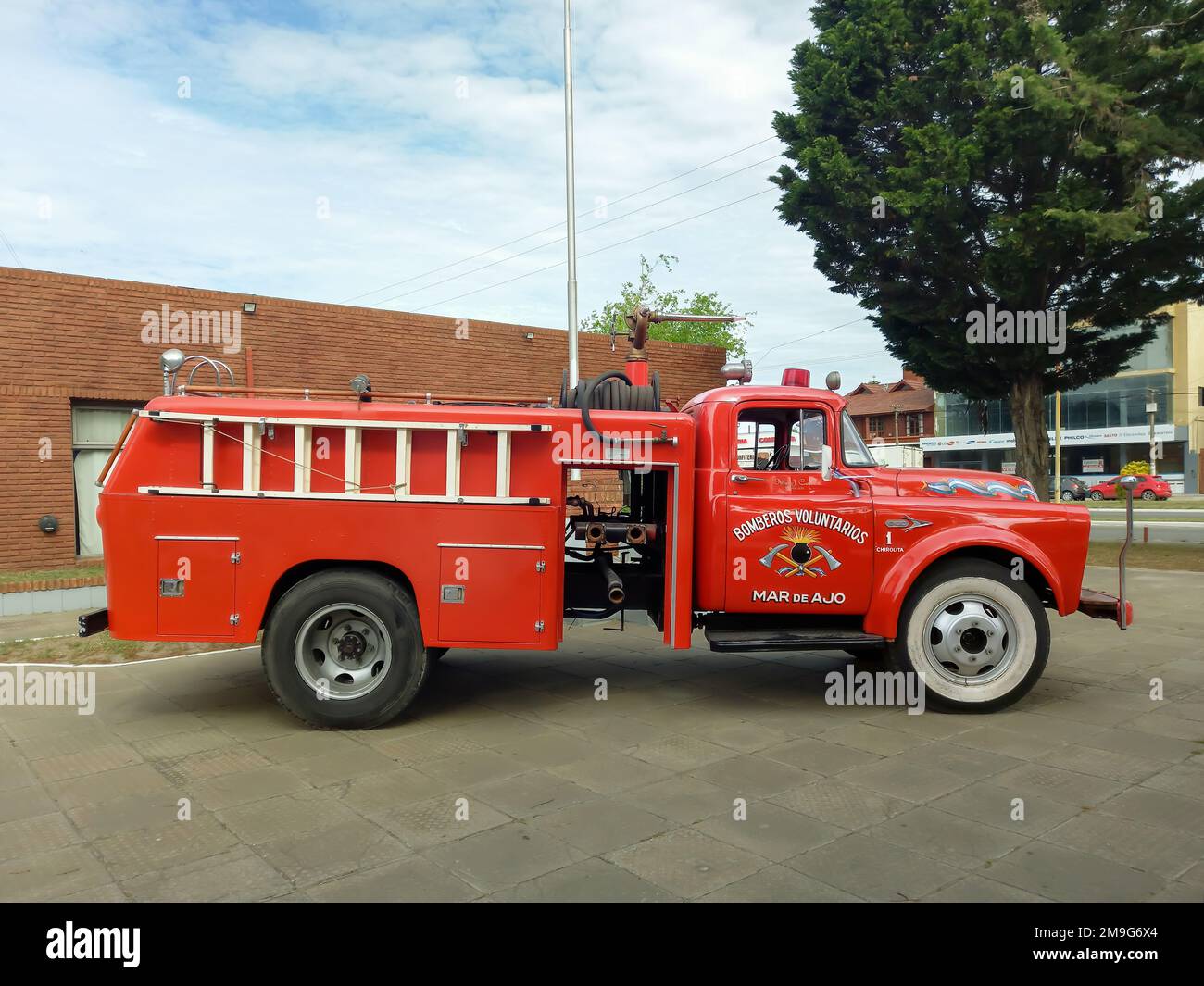 Old classic red 1950s Chrysler Fargo 500 fire truck pumper tanker ...