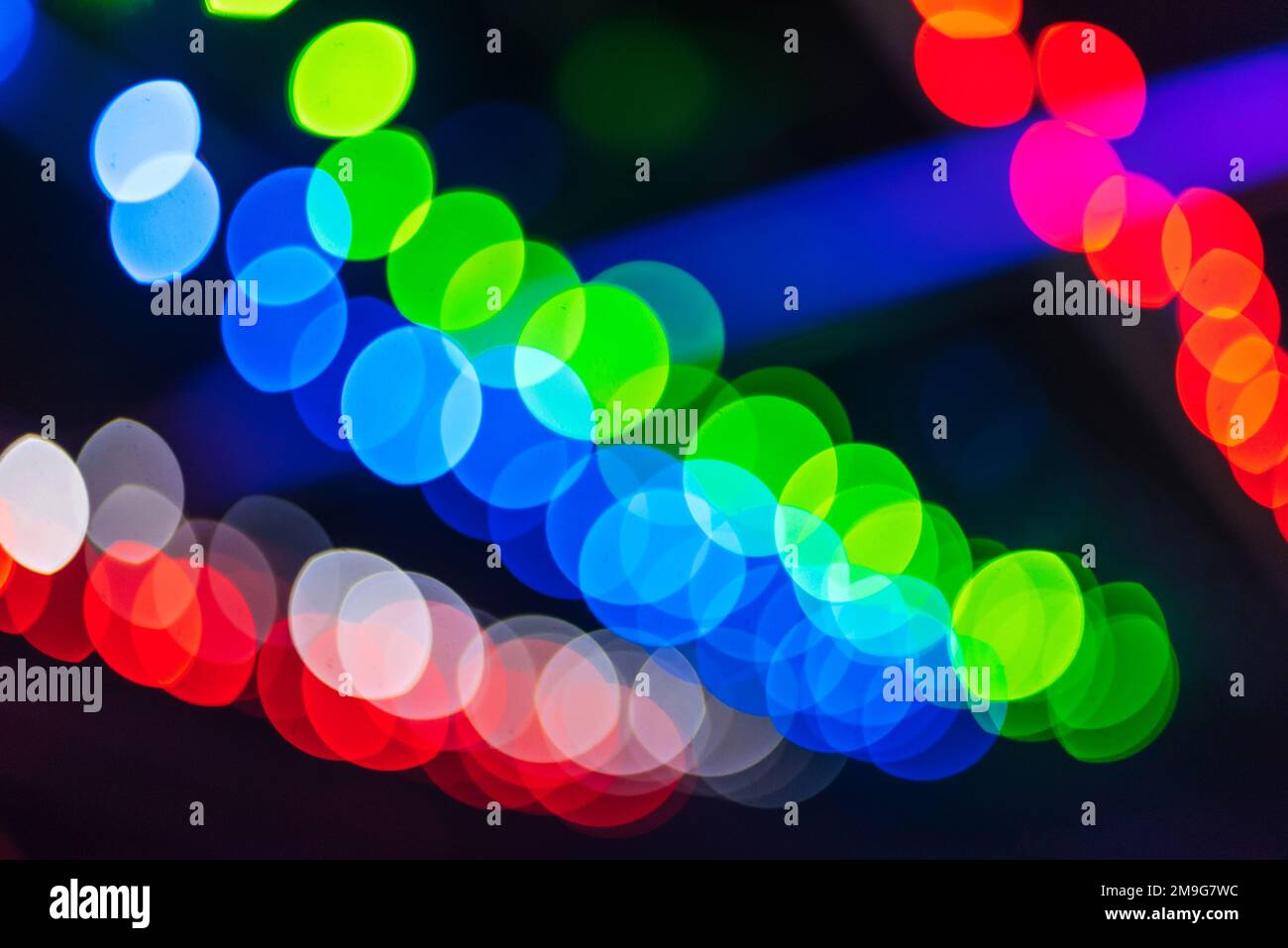 colorful abstract background with round colored bokeh from the bright ...