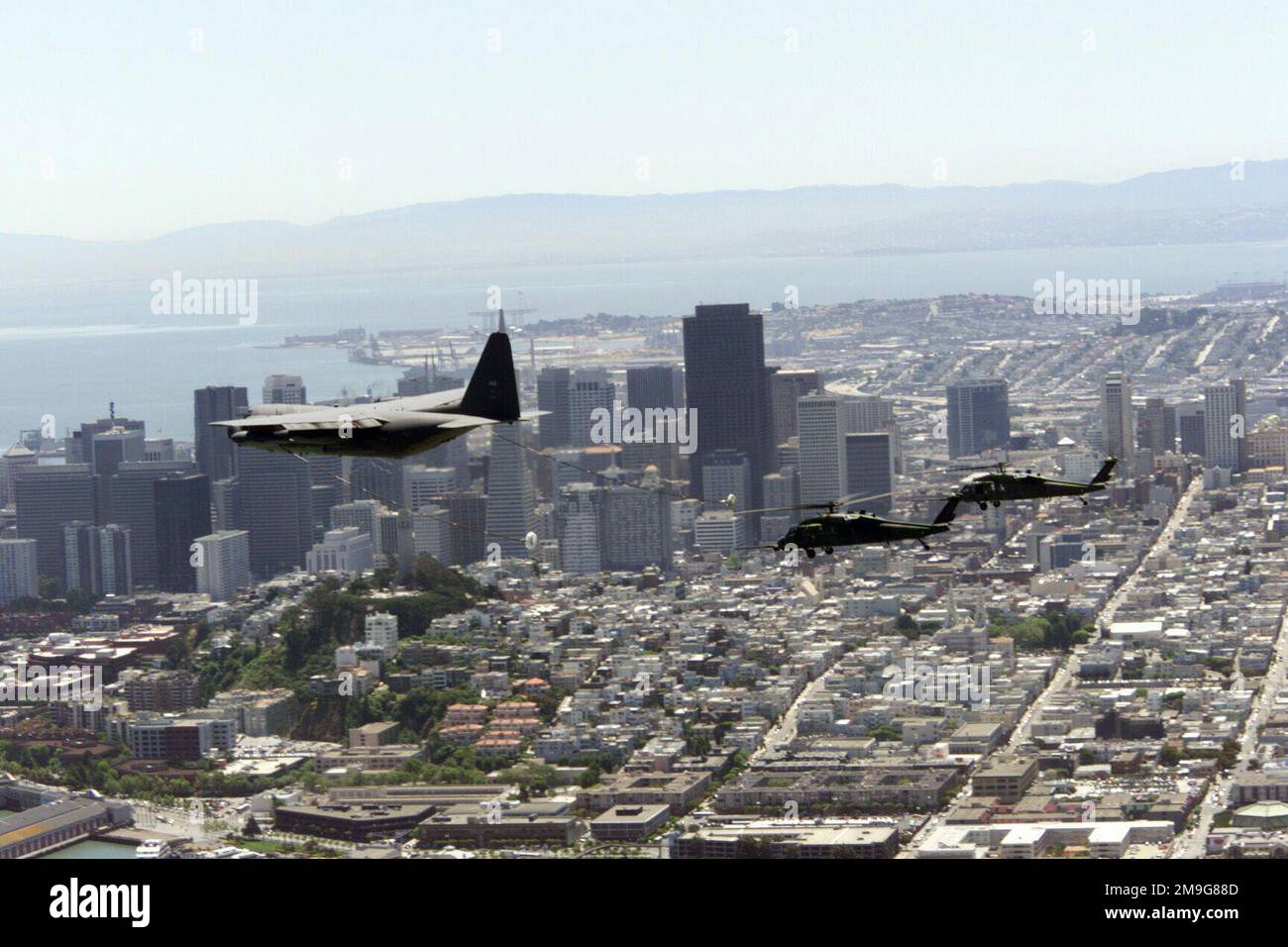 A MC-130 Combat Shadow tanker and two HH-60G Pavehawk helicopters from ...