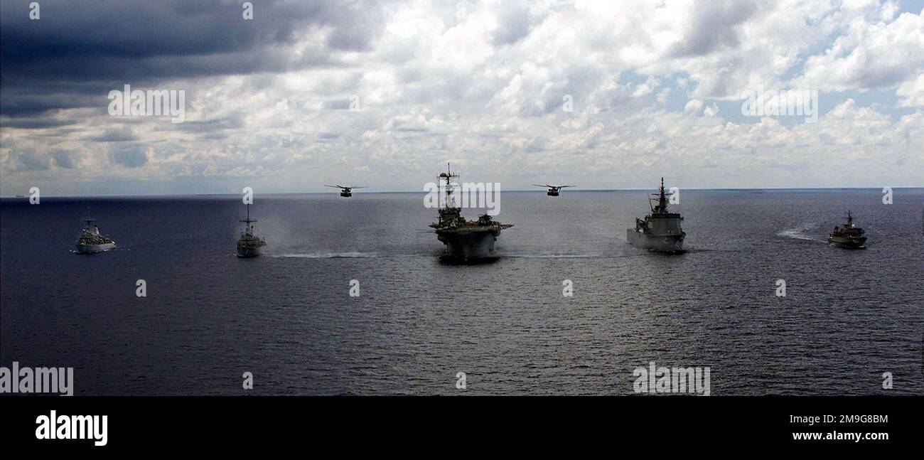 010607-N-7867W-501. [Complete] Scene Caption: A multi-national force of ...