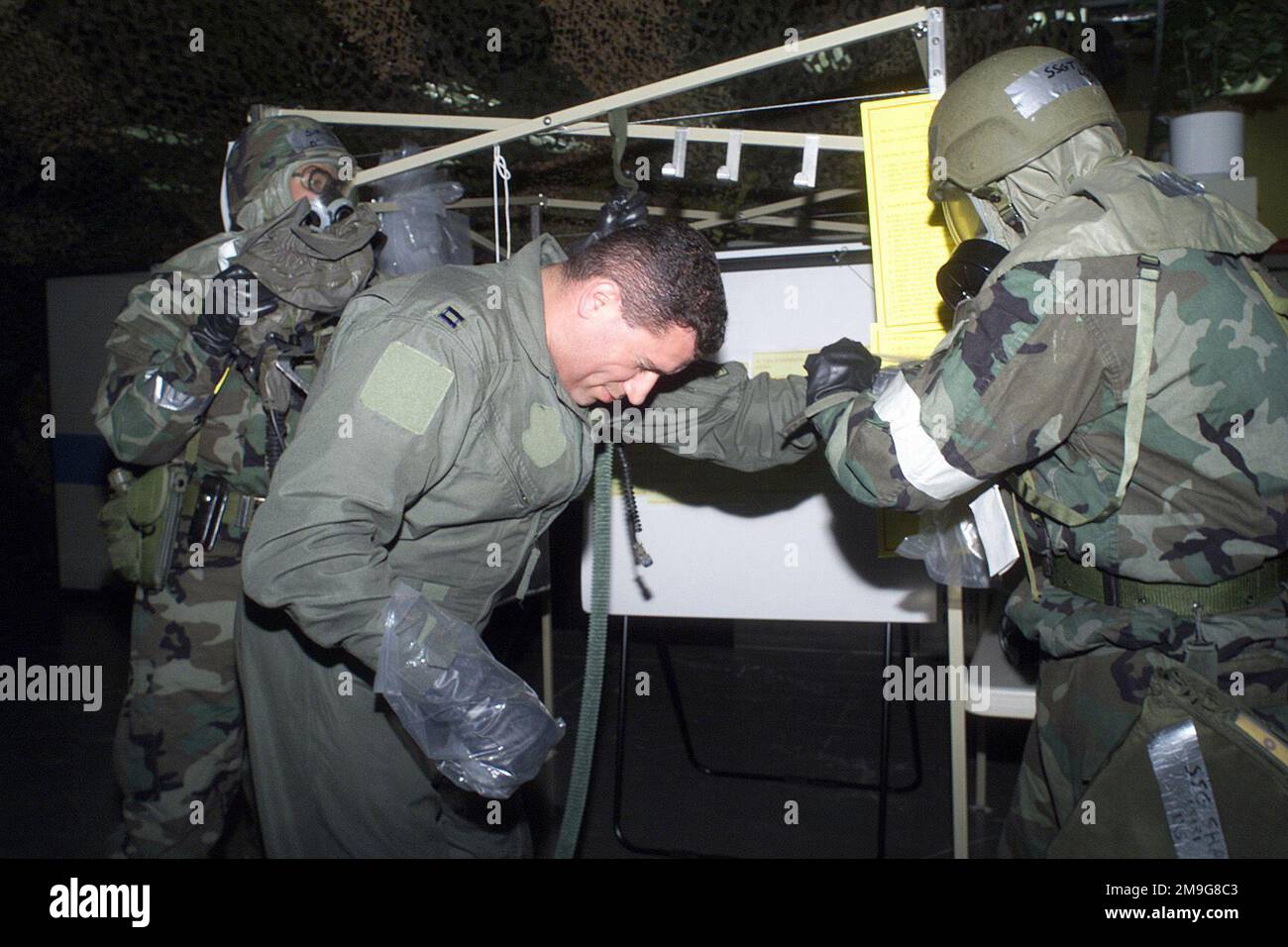 US Air Force SENIOR AIRMAN Paul Muggli (left), and US Air Force STAFF ...