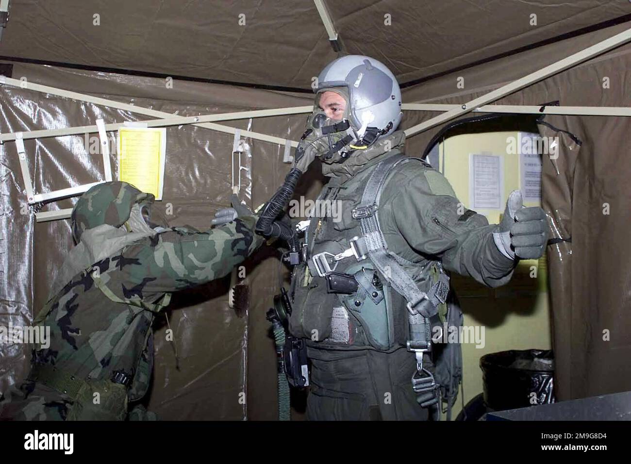 US Air Force AIRMAN Ken Sloan (left), 23rd Fighter Squadron, check US ...