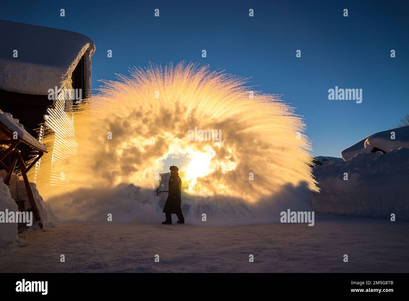 ALTAY, CHINA - JANUARY 18, 2023 - Police officers enjoy pouring water ...