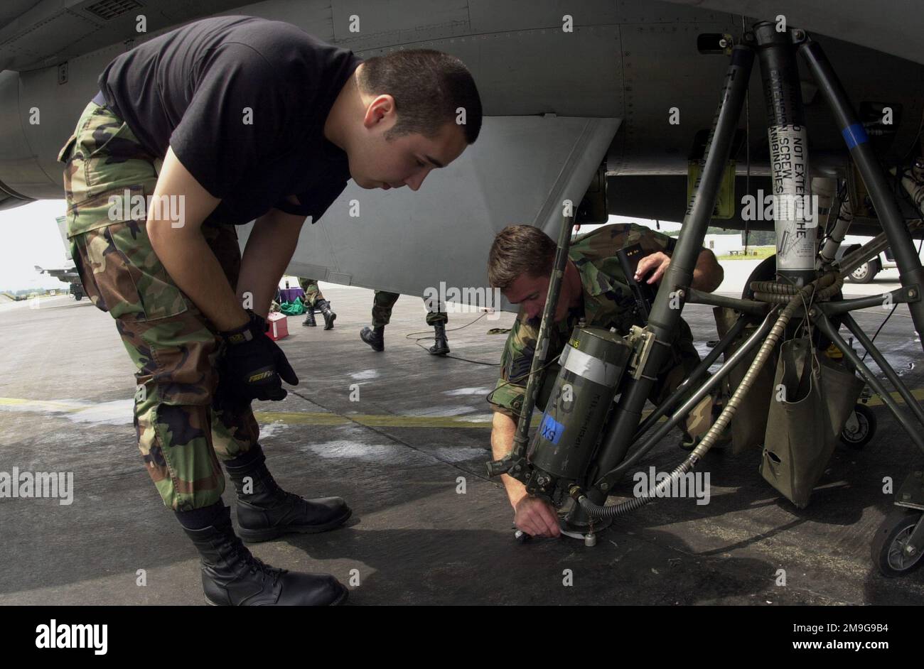 US Air Force Technical Sergeant Giovanni Miller (right), Expediter and ...