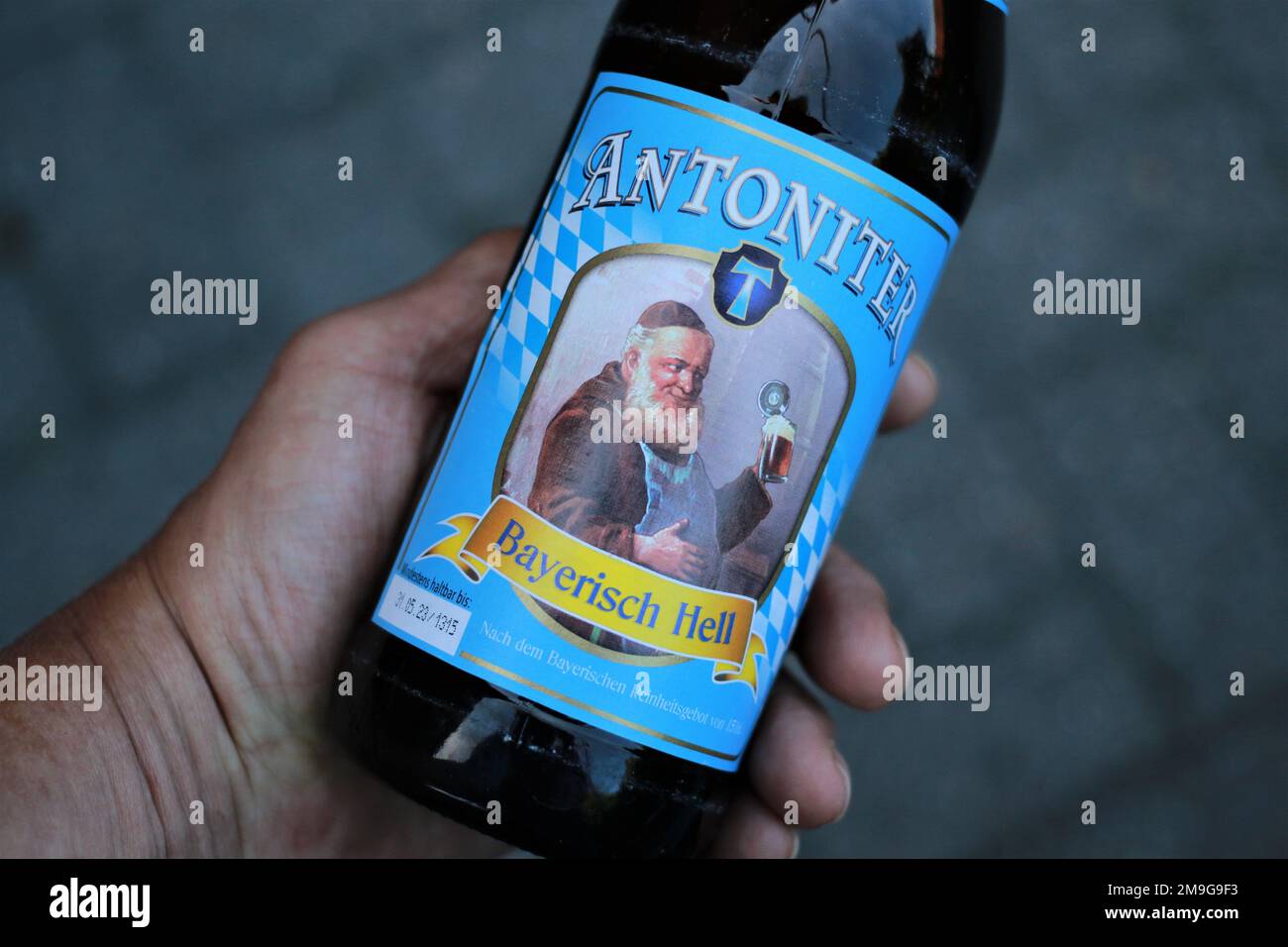 brewed in bavaria the blue label shows a monk with a beer glass Stock ...