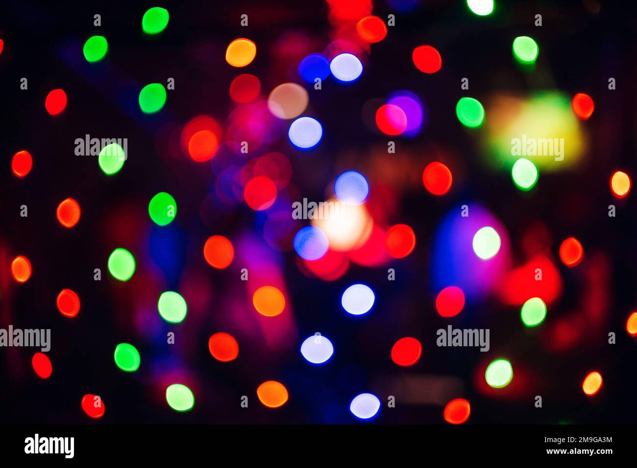 abstract blurred bright color background with bokeh from Christmas ...