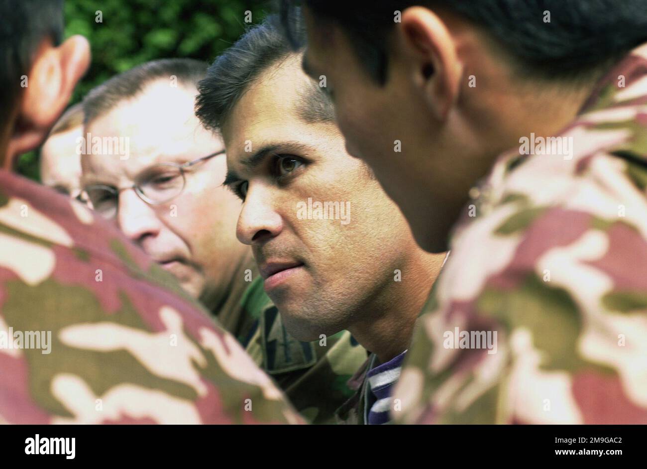 Uzbekistan Army Captain Askar Tuhtaev pays close attention to the ...