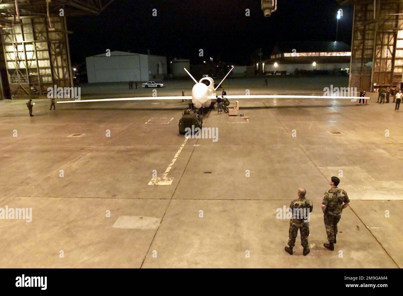 The Global Hawk unmanned aircraft is weighed and systems checked after ...