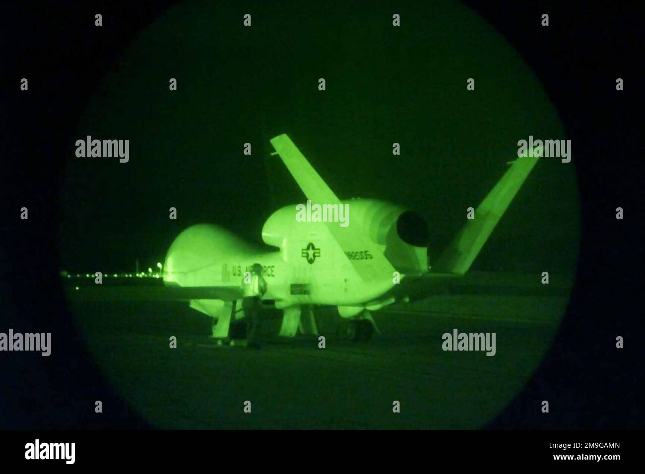 The Global Hawk unmanned aircraft is prepared for towing after arrival ...