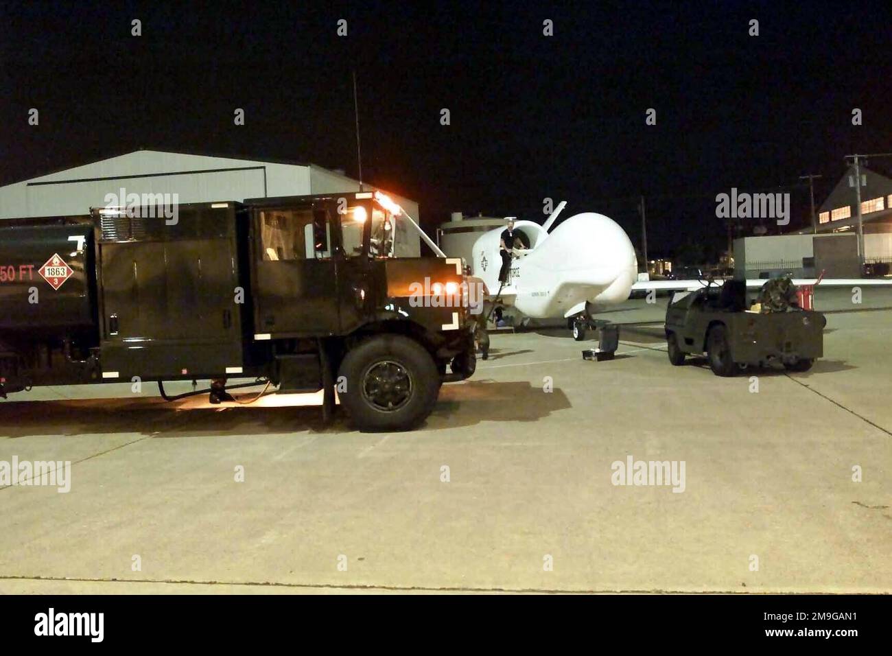 The Global Hawk unmanned aircraft is fueled after its arrival at ...