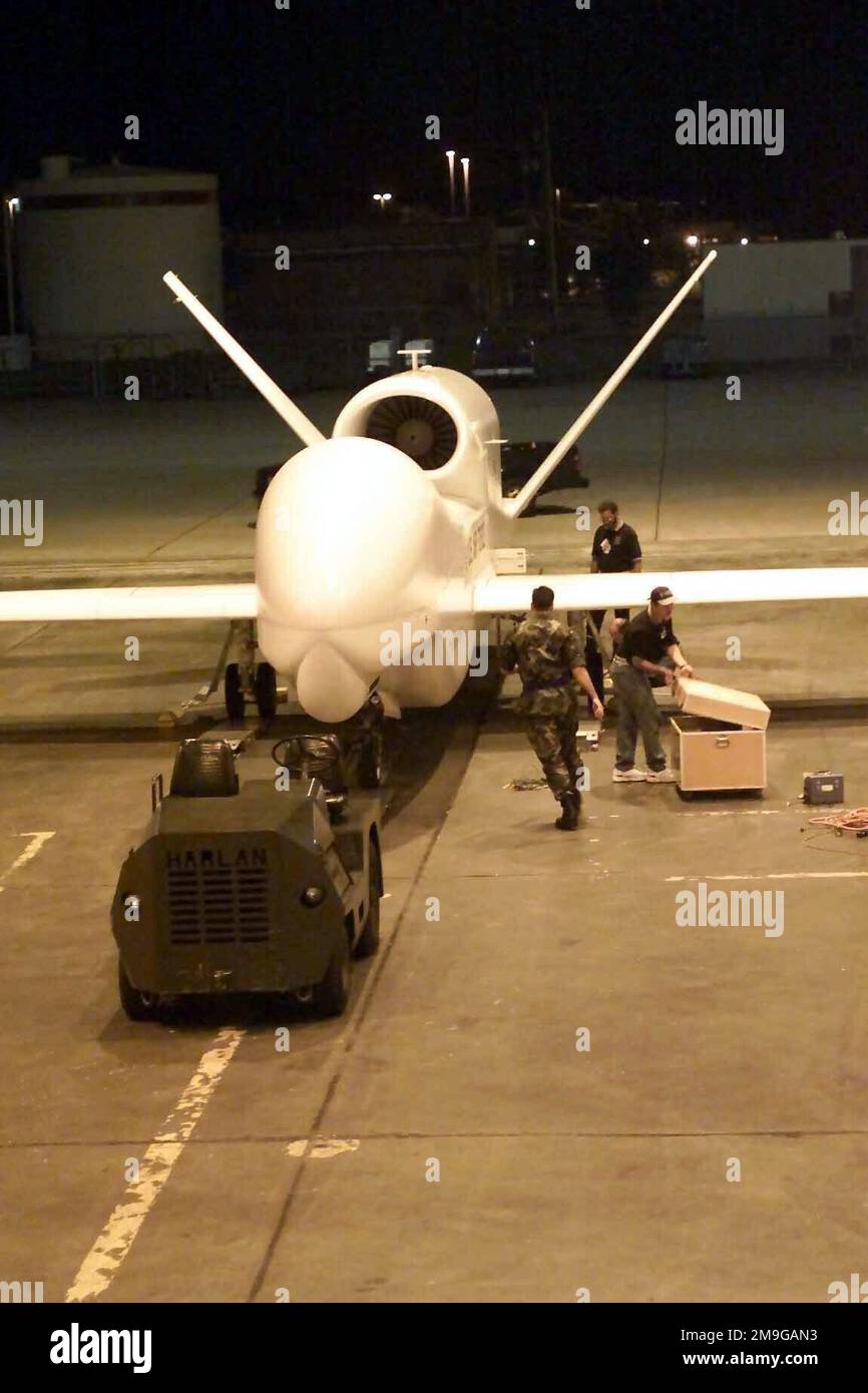 The Global Hawk unmanned aircraft is weighed and systems checked after ...
