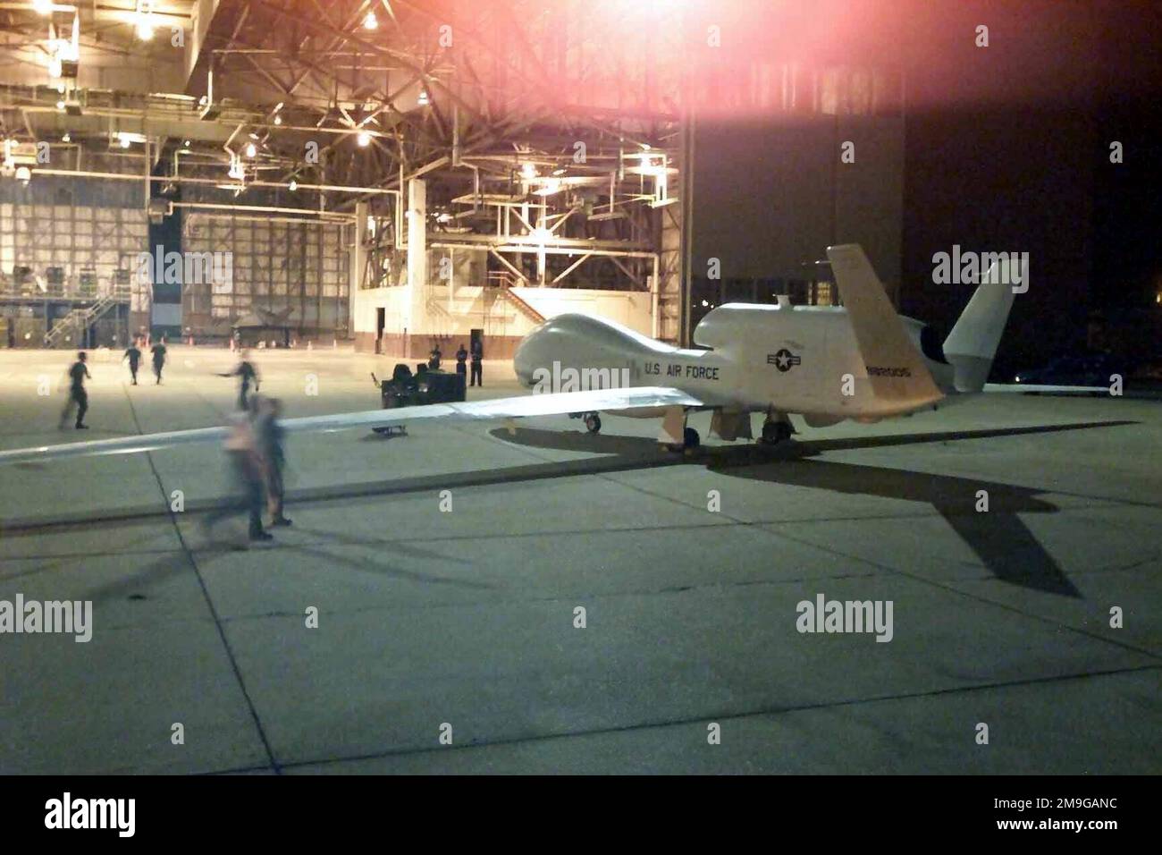 The Global Hawk unmanned aircraft awaits fueling after its arrival at ...