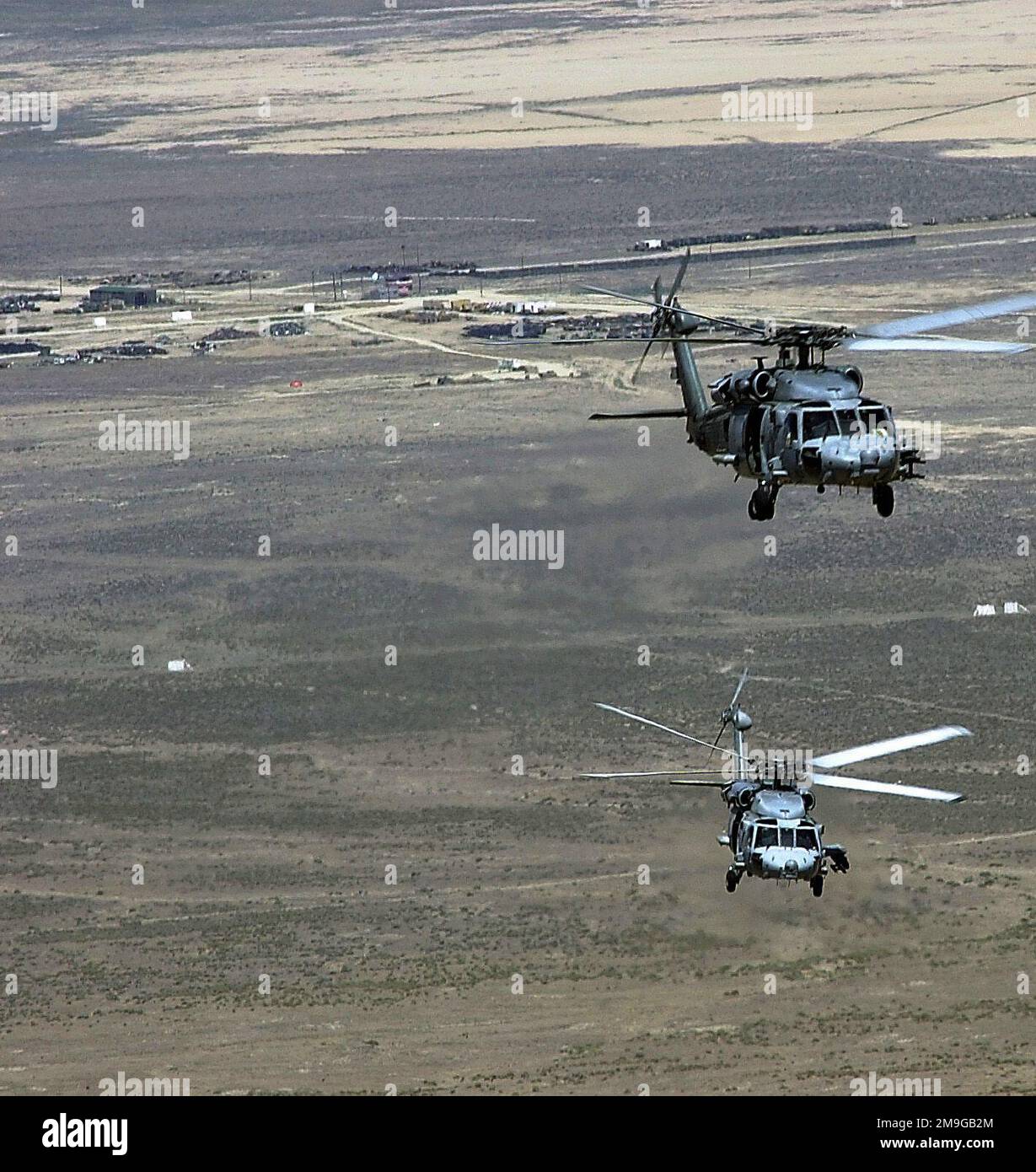 Two HH-60H SEAHAWK helicopters head back to home station after ...