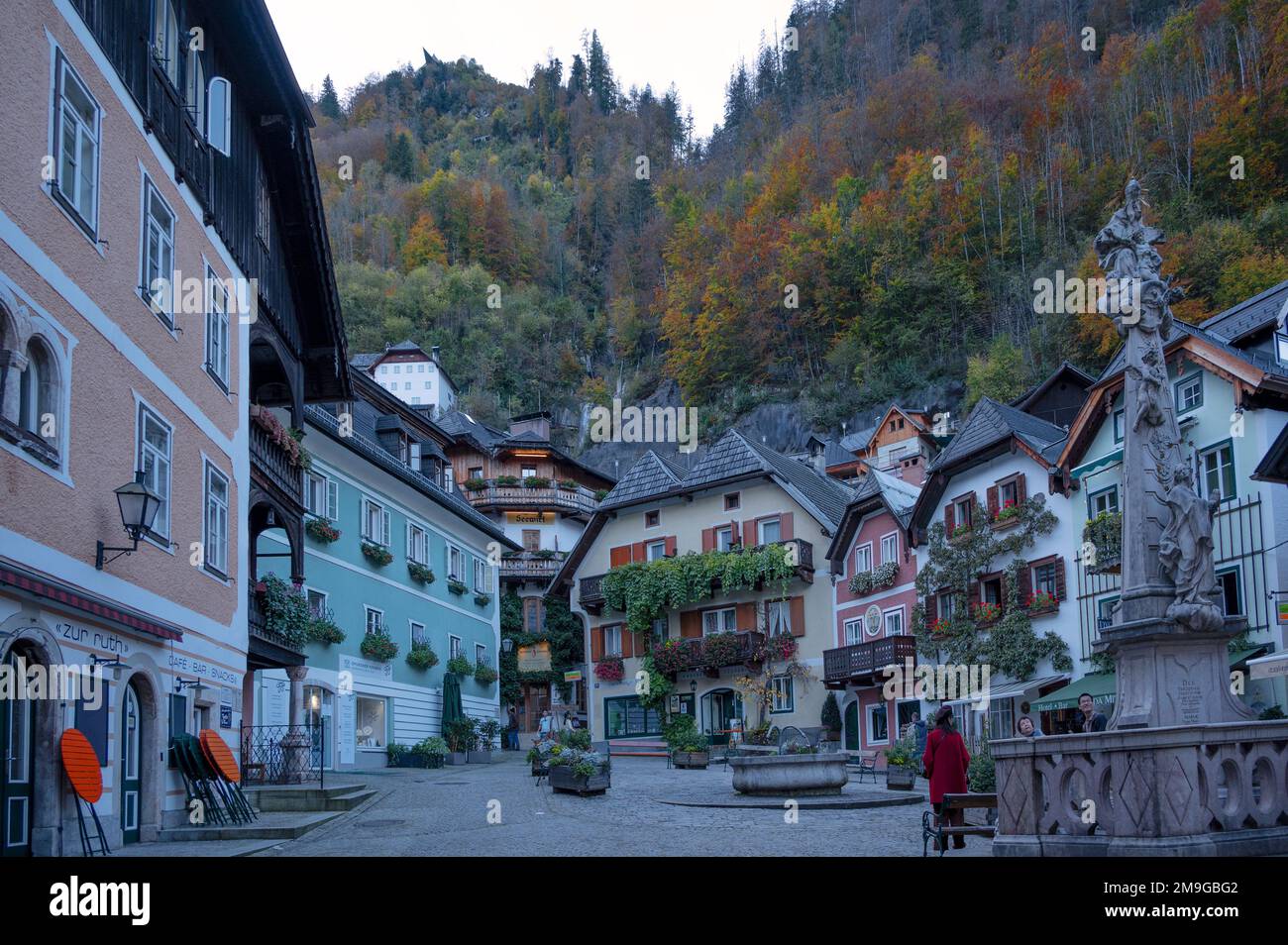 Hallstatt, Austria. View of a central street with colorful wooden ...