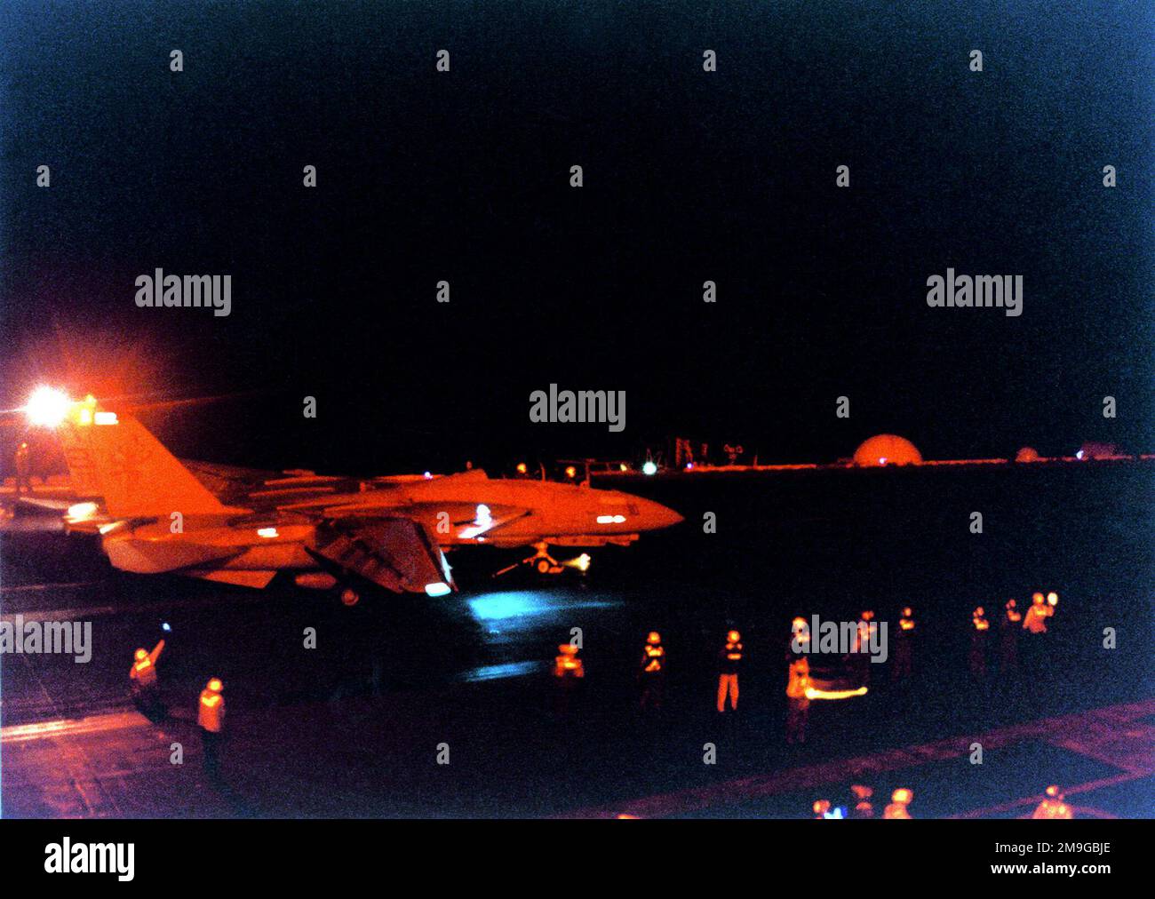 A US Navy (USN) F-14B Tomcat aircraft from Fighter Squadron One Zero ...