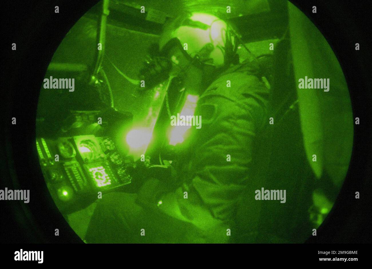 Seen in the green glow of a night scope while on the flightline, HH-60H ...