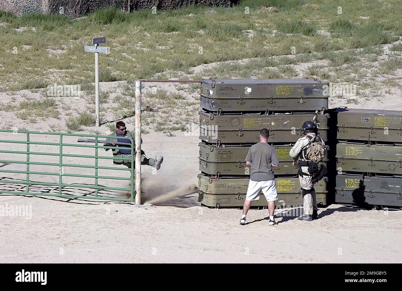 A simulated hostile national kicks dirt at Navy friendly forces ...