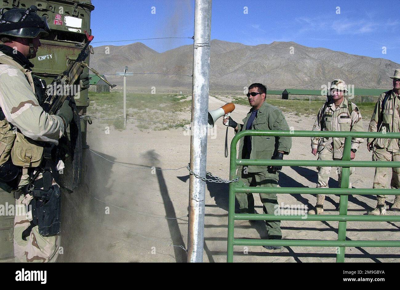 Rescue forces challenge a hostile national at the perimeter of the ...