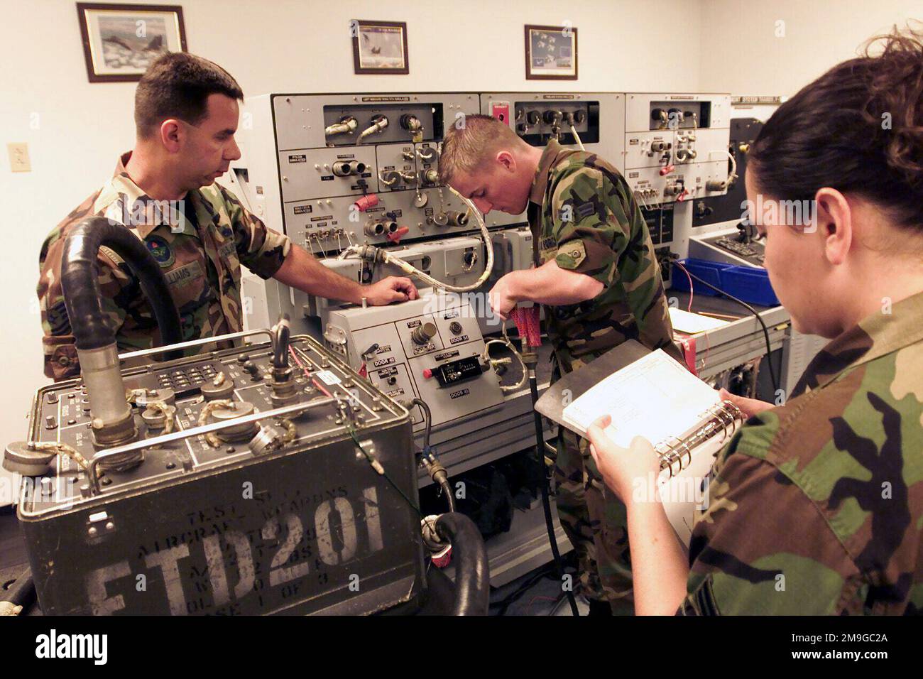 Technical Sergeantt Cary Williams, left, Weapons Instructor, Det 18 ...
