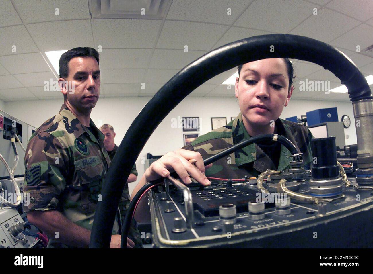 AIRMAN First Class Adriane Bean, right, Weapons Load Crew Member for ...