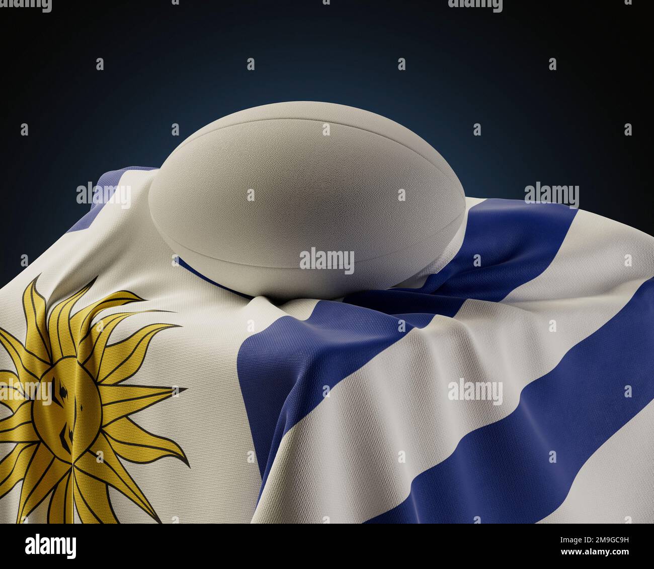 A regular rugby ball resting on a Uruguay flag draped over a plinth on ...
